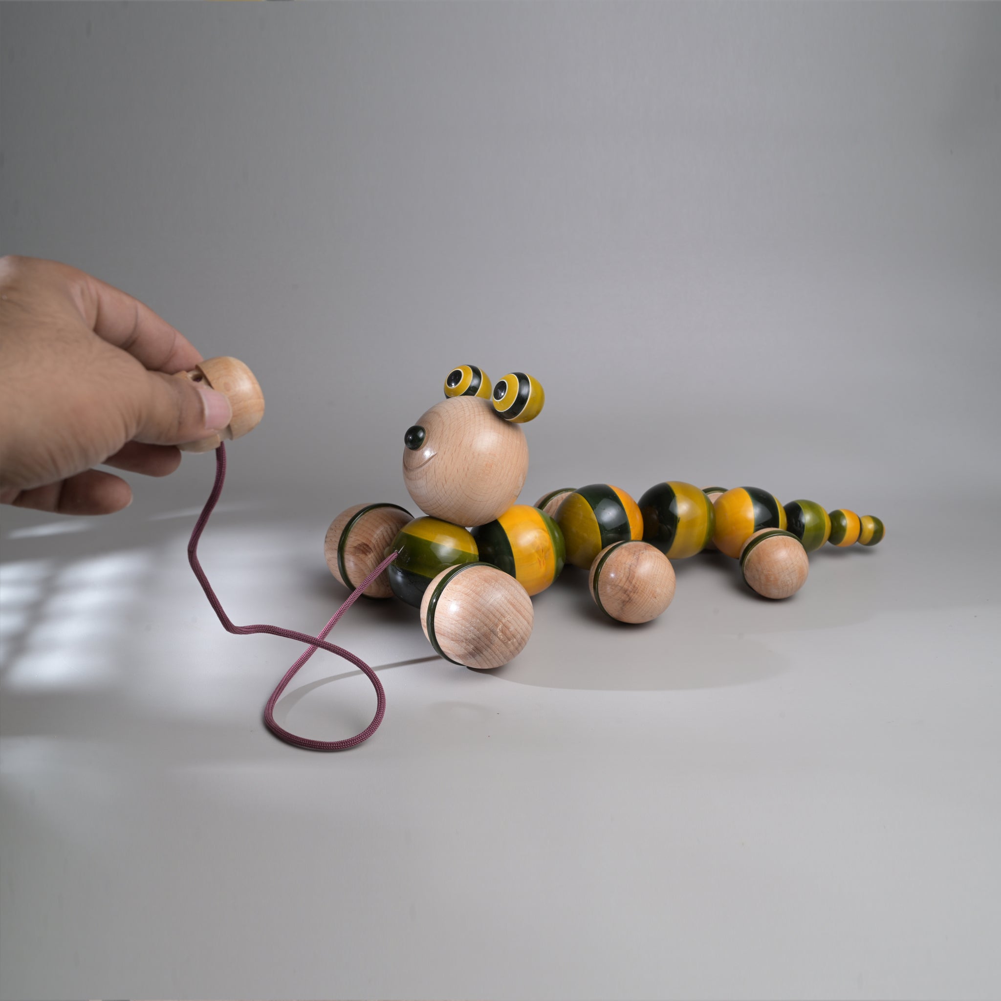 WIGGLES the caterpillar pull toy – varnamcraftcollective